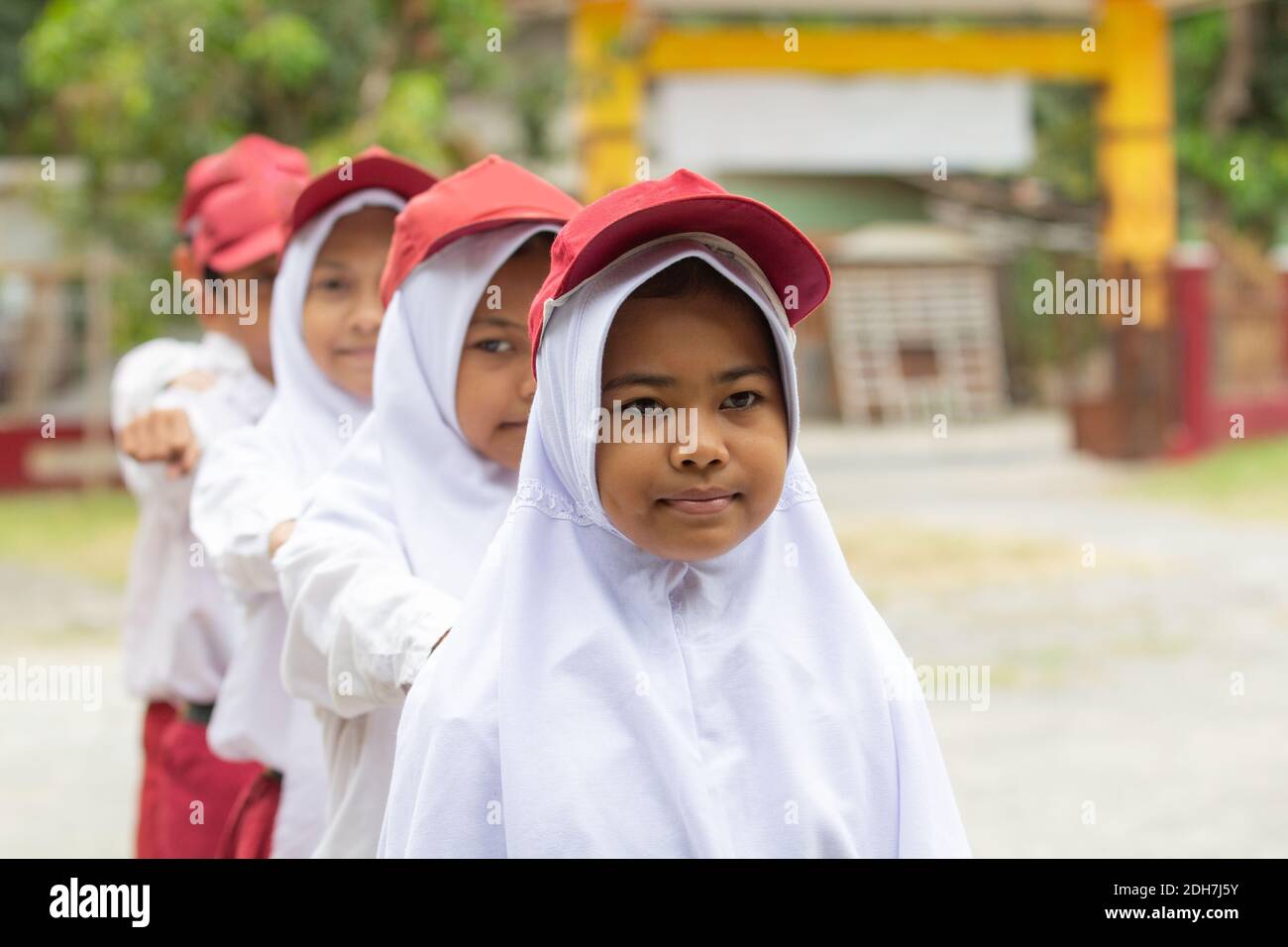 portraits of students arranging during flag raising ceremony Stock ...