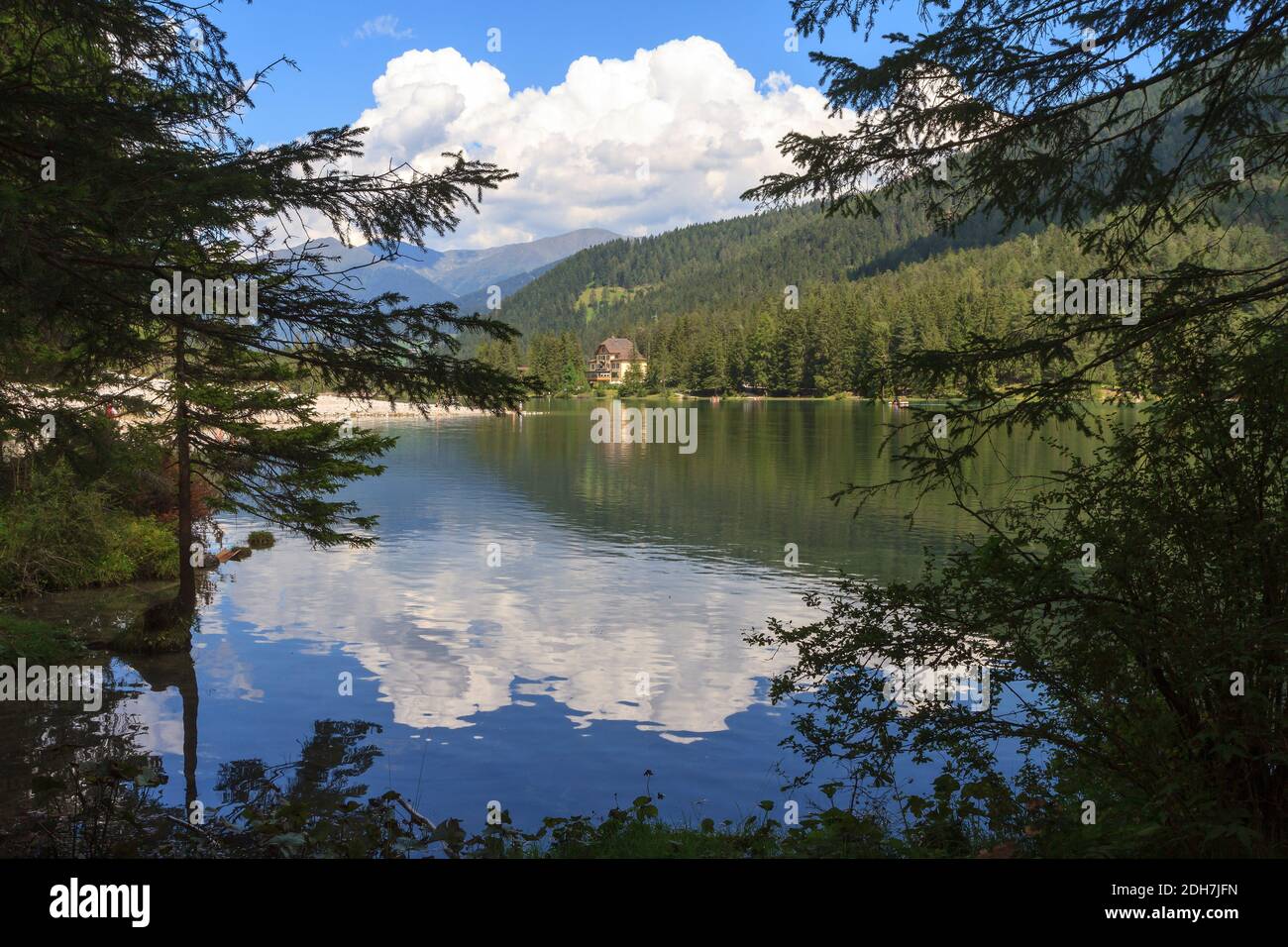 View of Dobbiaco lake in the Dolomites mountains Stock Photo - Alamy