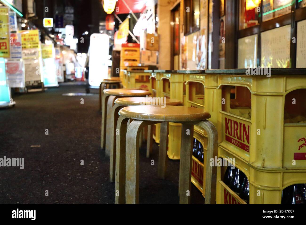 Few people walk in restaurants and bars district in Tokyo's Shimbashi ...