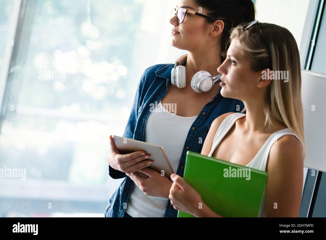 University student girl bored, frustrated and overwhelmed by studying ...