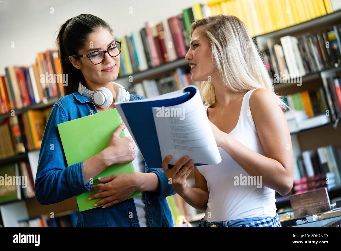 Education concept. University students preparing for exam, talking in ...