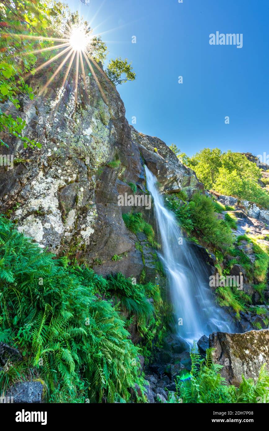 Long exposure of waterfall and starry sun Stock Photo - Alamy