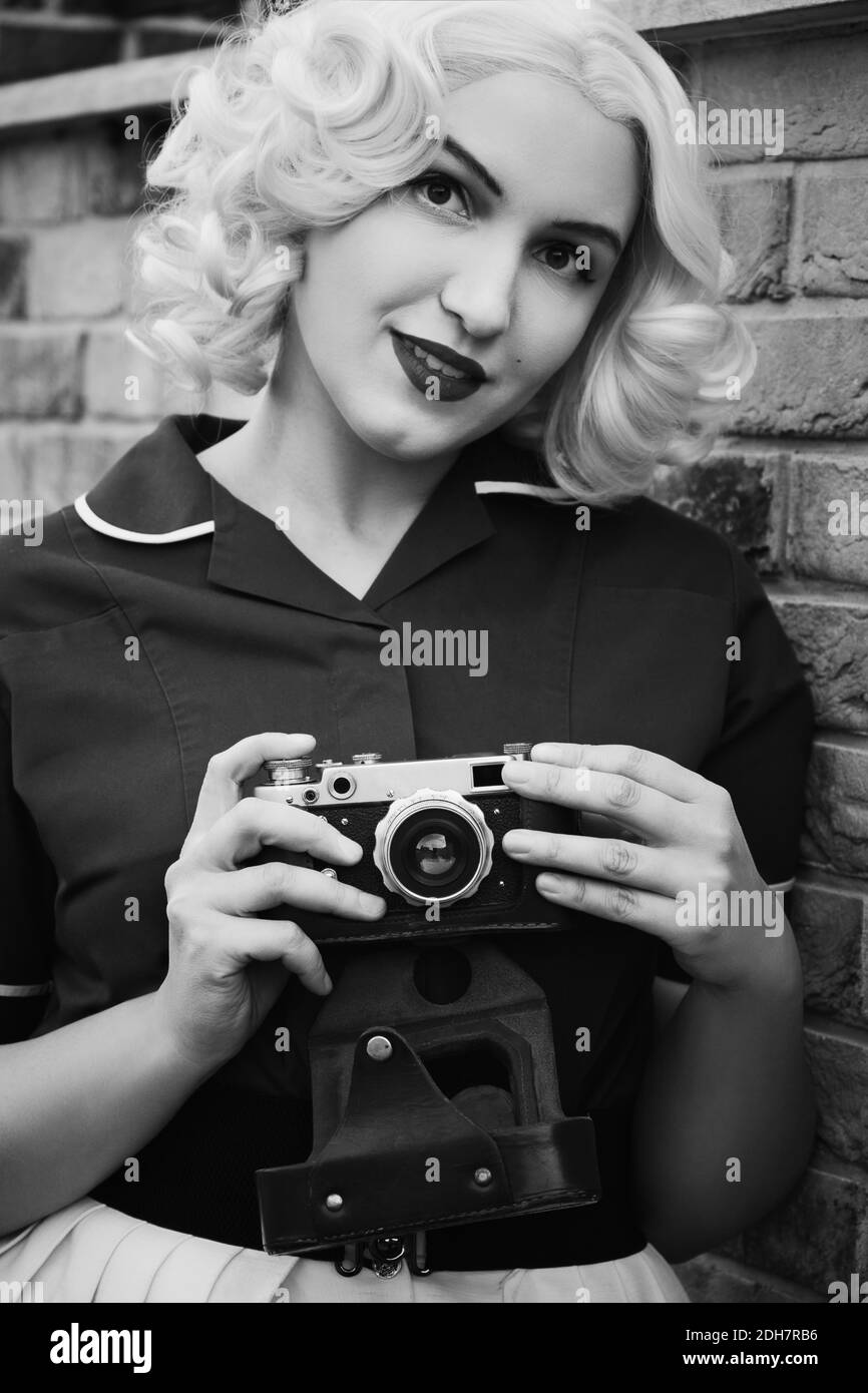 Old woman holding picture Black and White Stock Photos & Images - Alamy