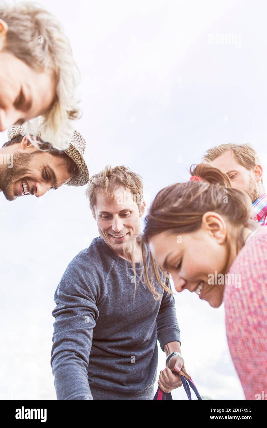 Vertical group happy friends hi-res stock photography and images - Alamy