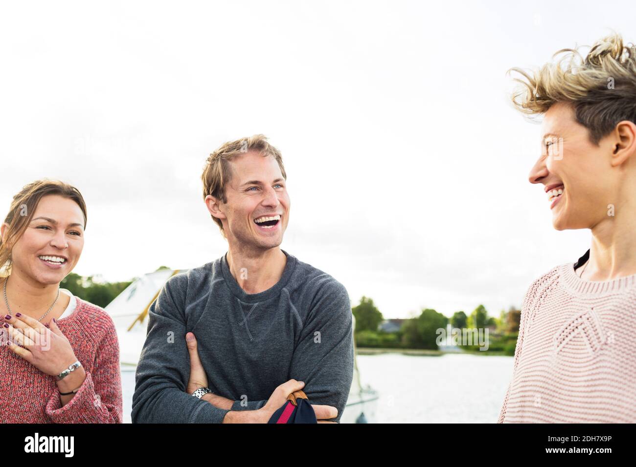 Happy friends spending quality time outdoors Stock Photo - Alamy