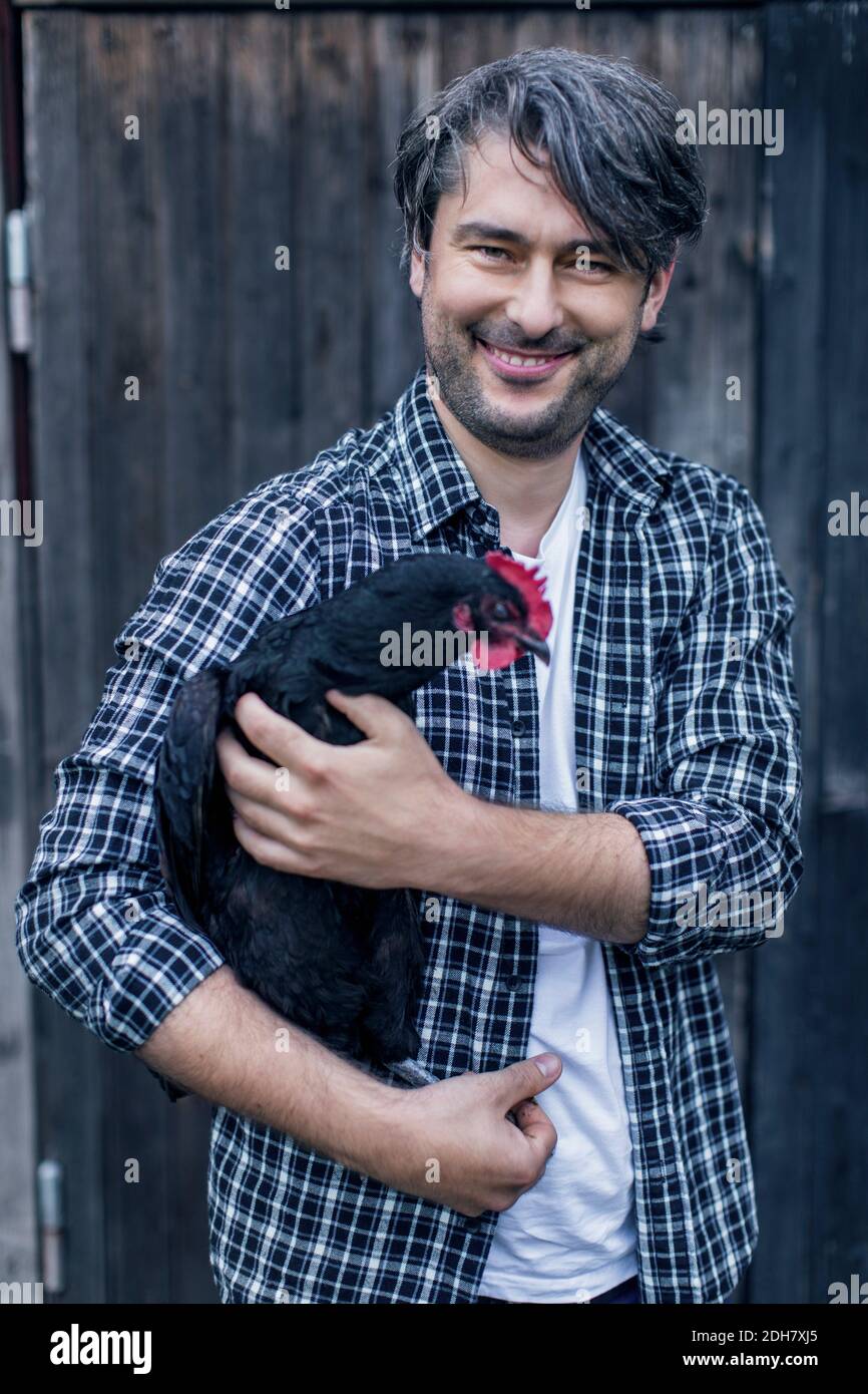 Man with hen hi-res stock photography and images - Alamy