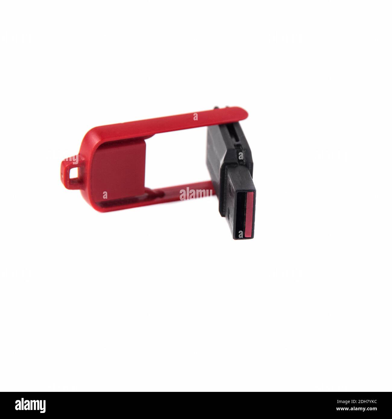 Red and black plastic USB flash drive isolated on white background ...
