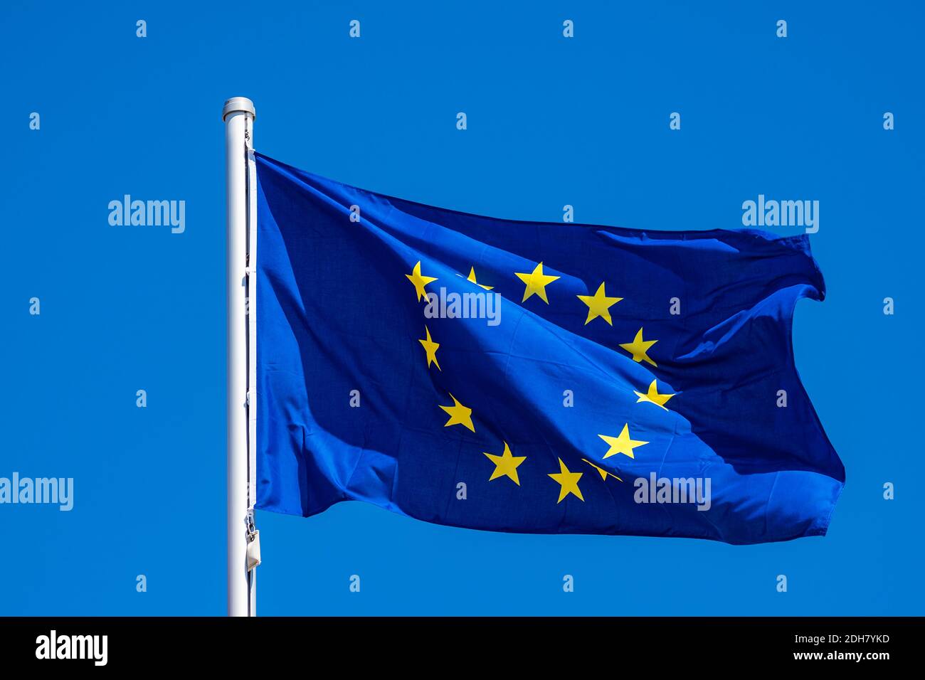 Flag of Europe with blue sky in Warnemuende, Germany Stock Photo - Alamy