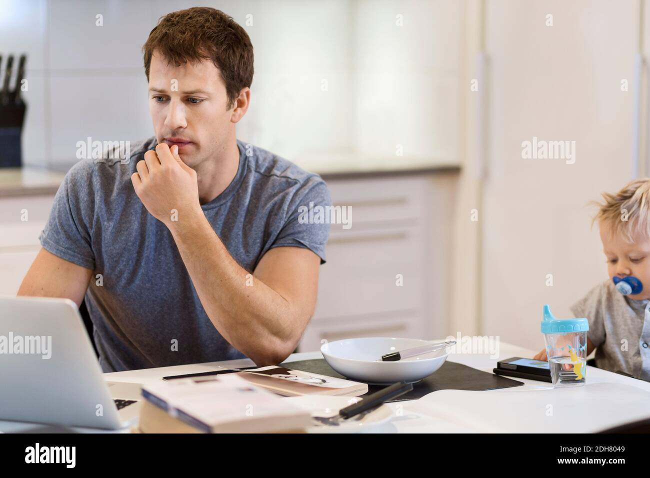 Boy at dining table hi-res stock photography and images - Alamy