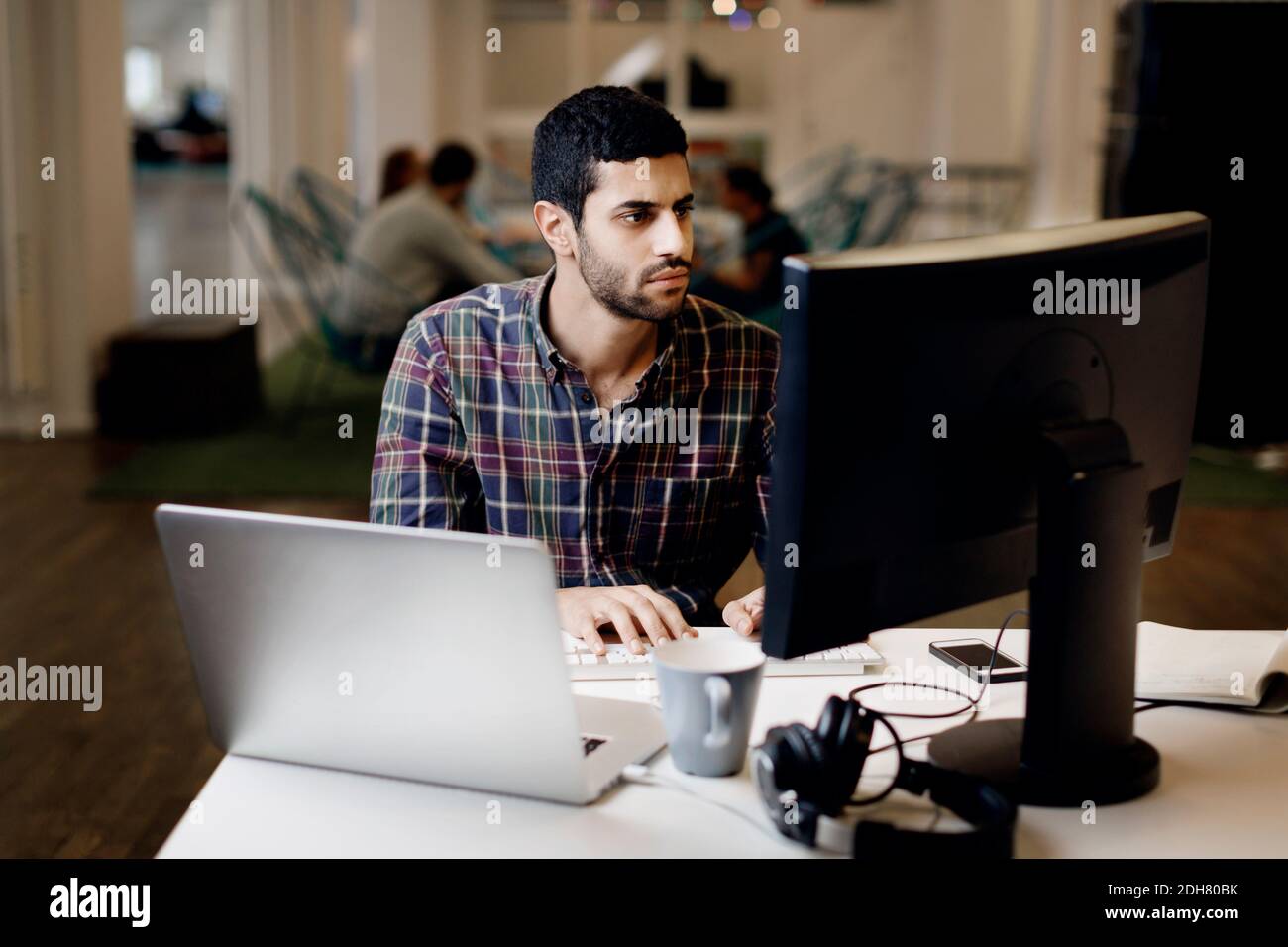 Businessman working on desktop pc hi-res stock photography and images ...