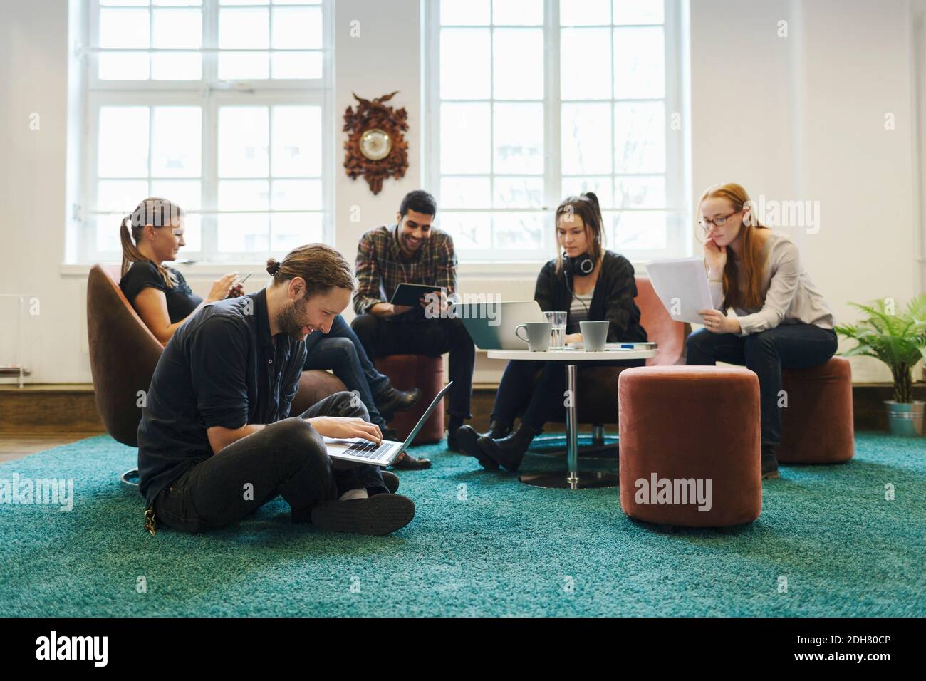 Business people working in creating workspace Stock Photo - Alamy
