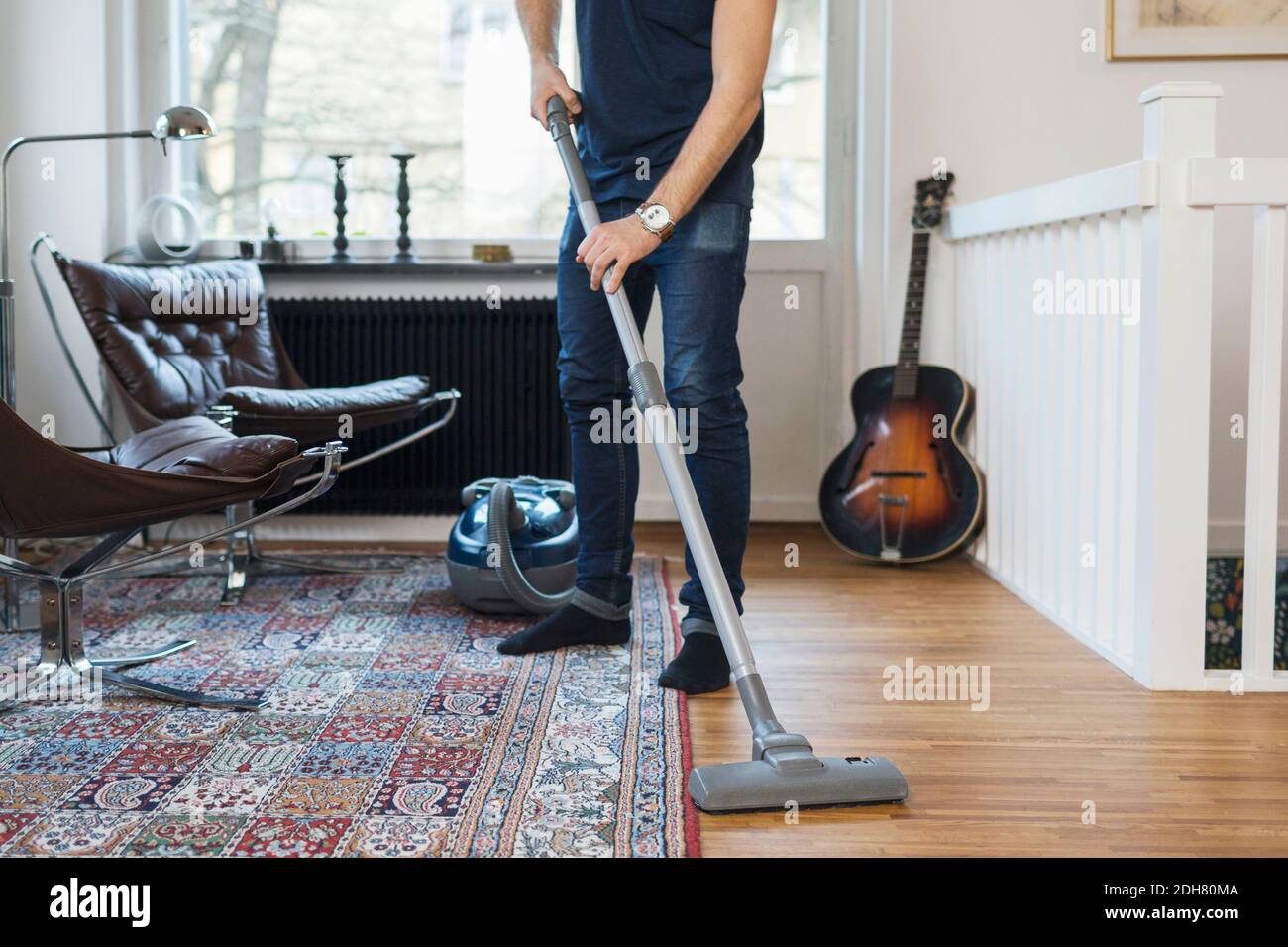 Vacuuming floor hi-res stock photography and images - Alamy