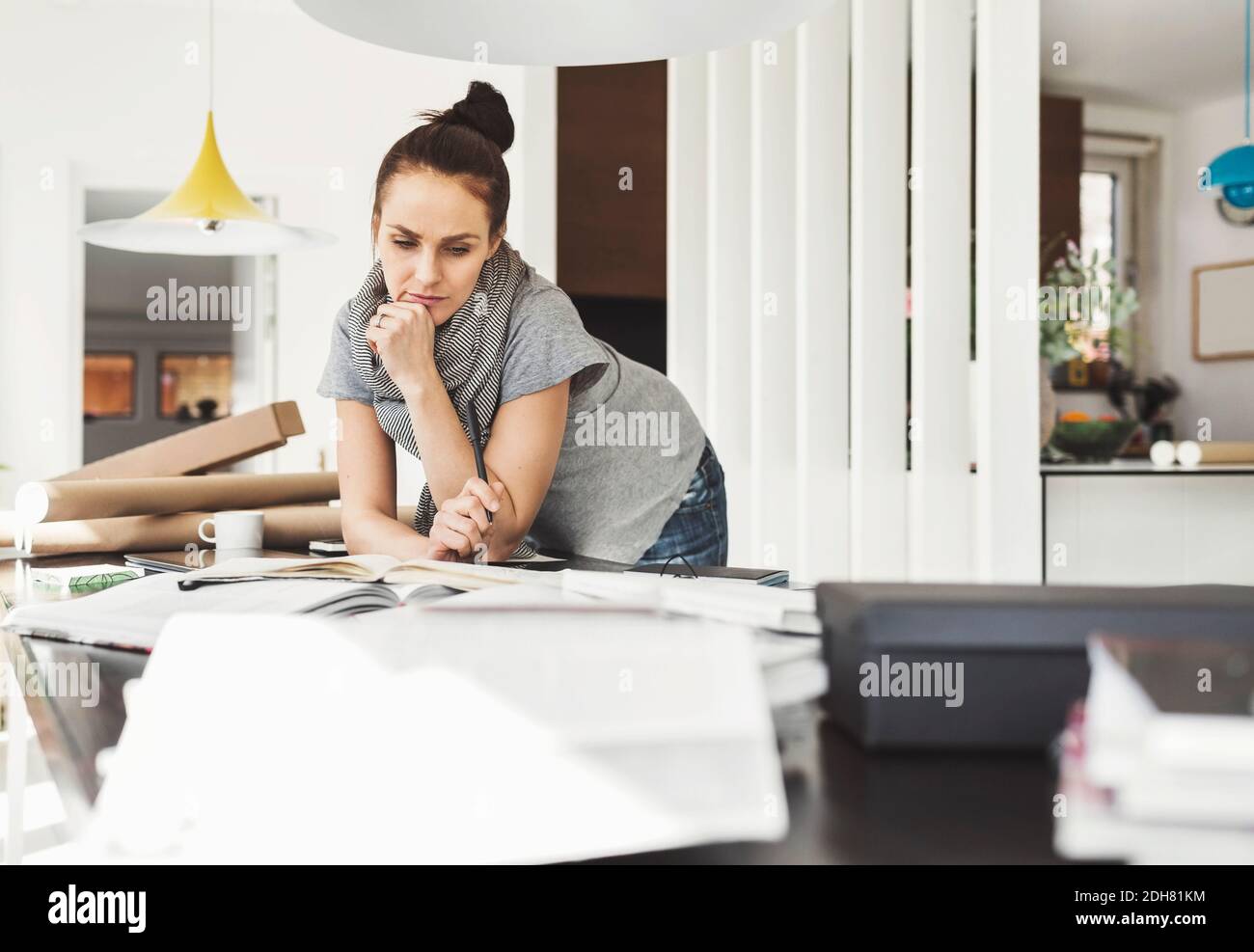 Leaning on table hi-res stock photography and images - Alamy