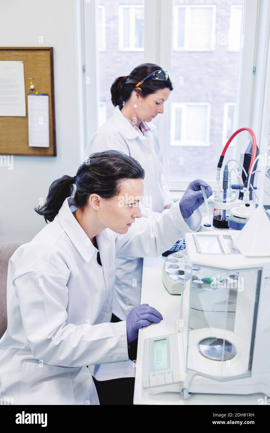 Female scientists working in laboratory Stock Photo - Alamy