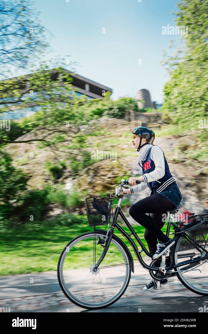 Professional businesswoman riding bicycle hi-res stock photography and ...