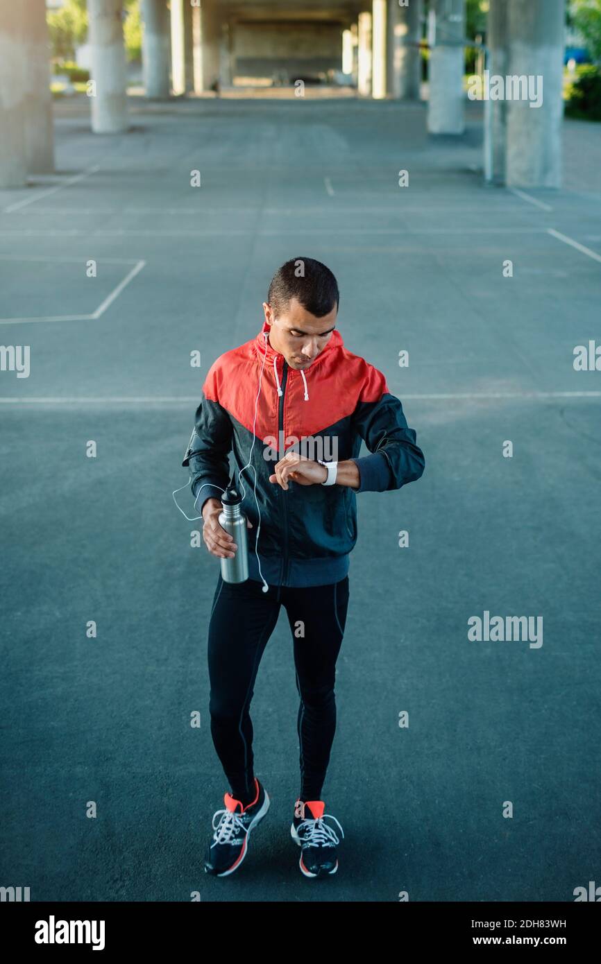 Checking time man in hi-res stock photography and images - Alamy