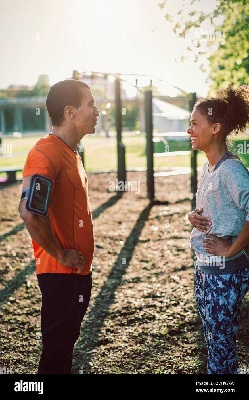 Standing face to face communication talking hi-res stock photography ...