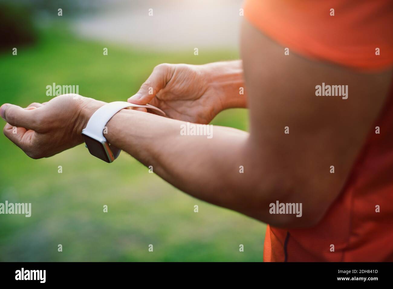 Man running watch park hi-res stock photography and images - Alamy