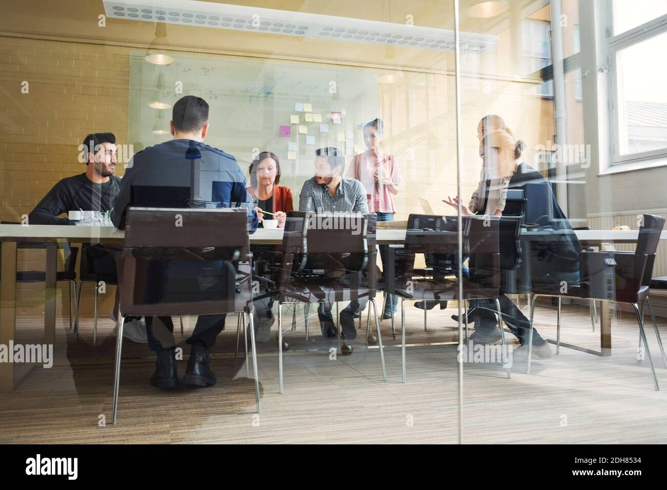 Multi-ethnic business people having discussion in conference room Stock ...