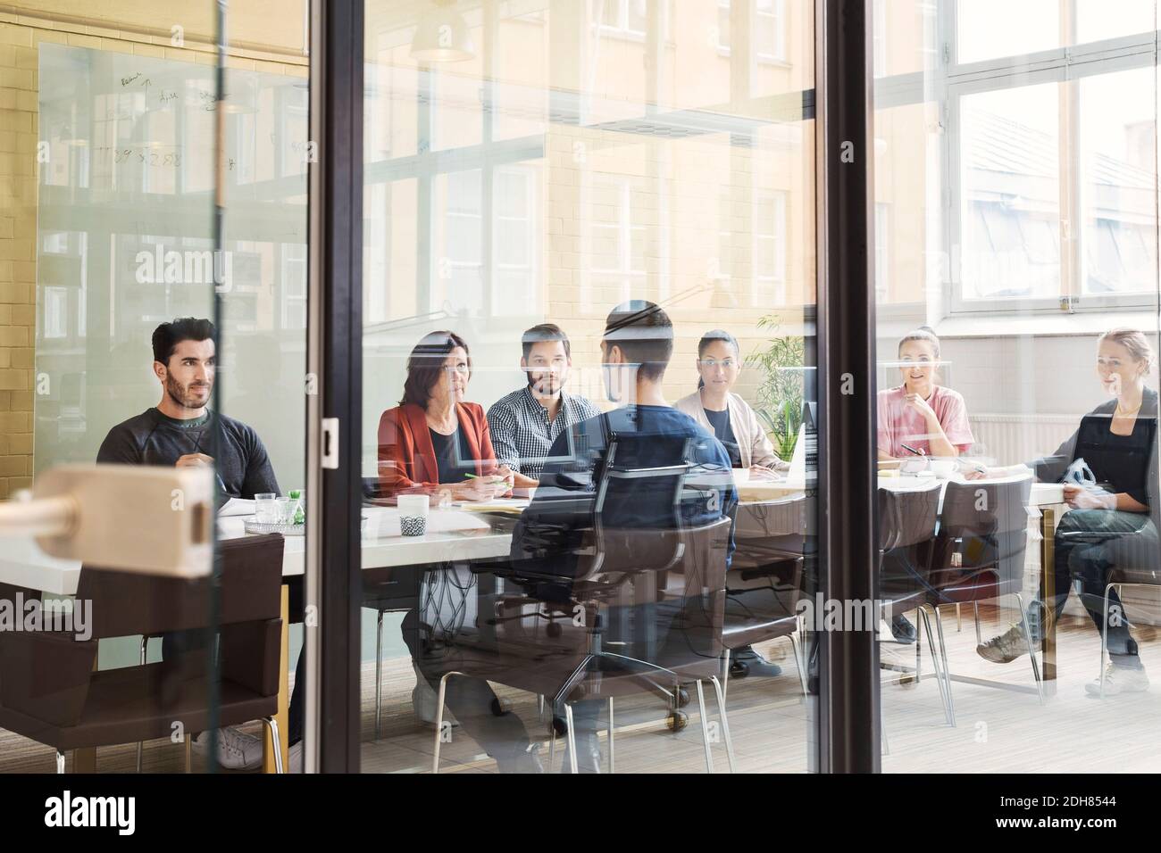 Multi-ethnic business people having discussion in conference room Stock ...