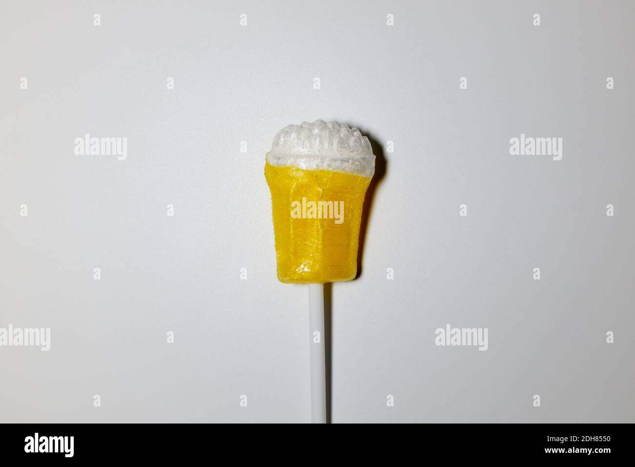 Beer mug shaped soda lollipops Stock Photo - Alamy