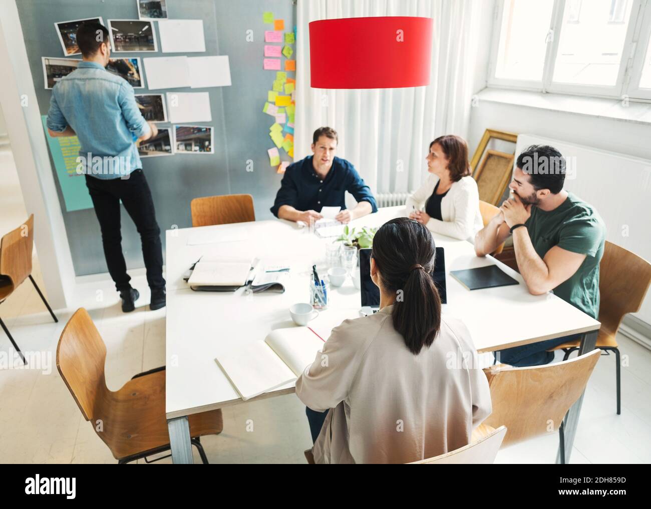 Business team brainstorming discussing working hi-res stock photography ...