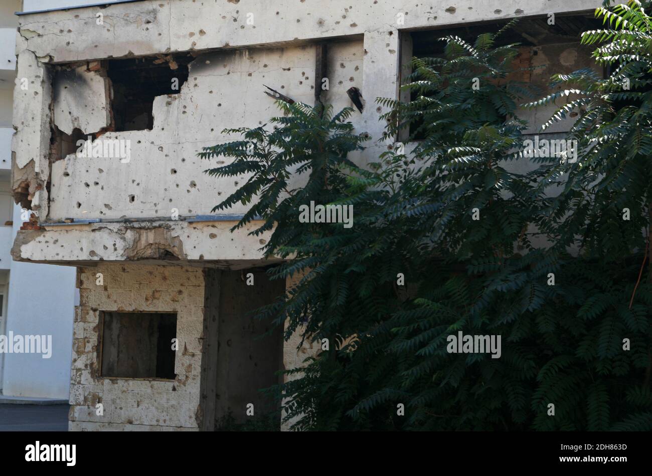 Damaged and ruined building after Bosnian War, Mostar, Bosnia and ...