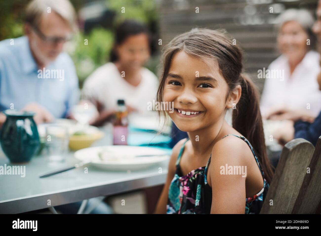 Girl ponytail sitting table in hi-res stock photography and images - Alamy