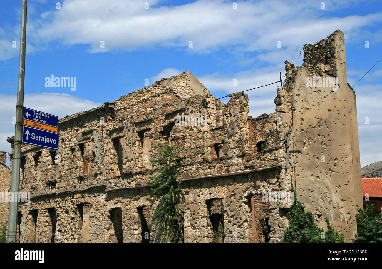 Damaged and ruined building after Bosnian War, Mostar, Bosnia and ...