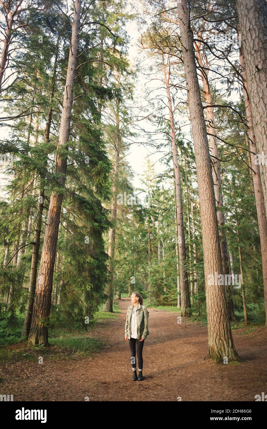 Tall woman standing hi-res stock photography and images - Alamy
