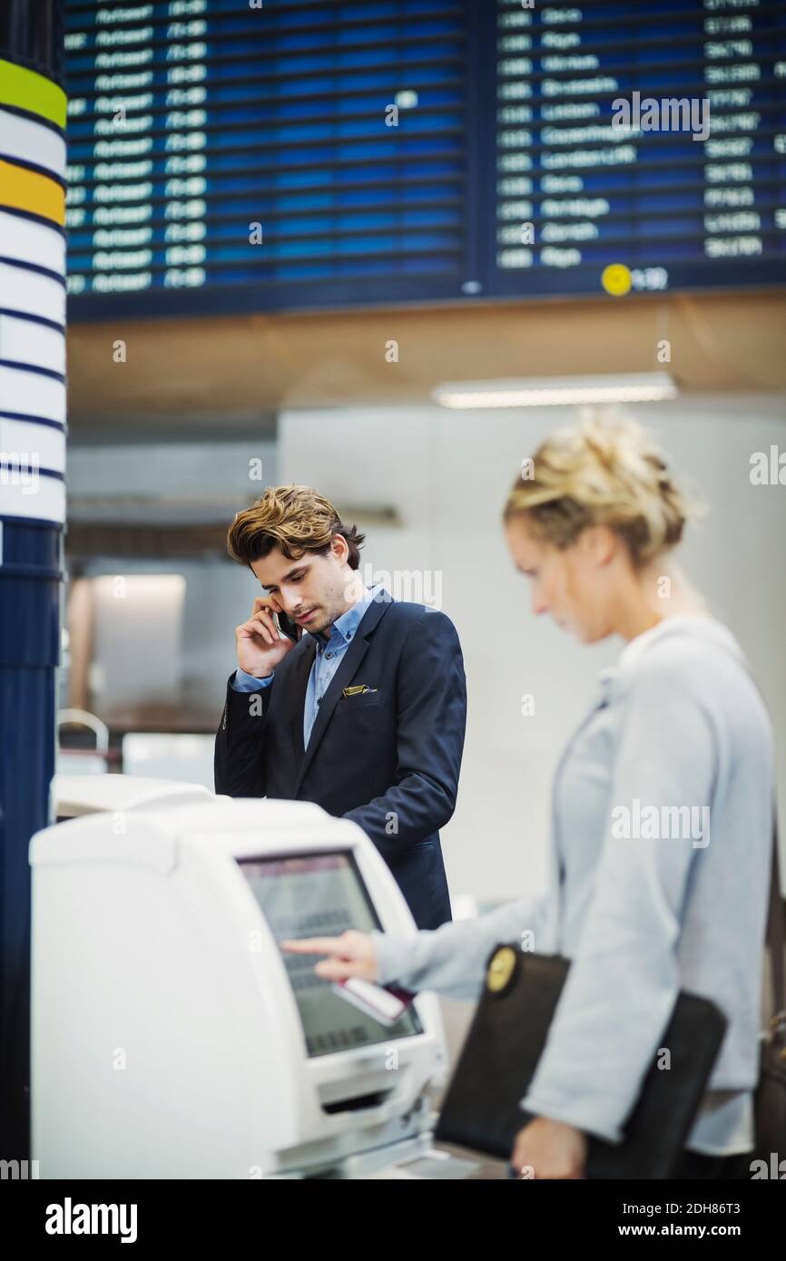 Check in machines hi-res stock photography and images - Alamy