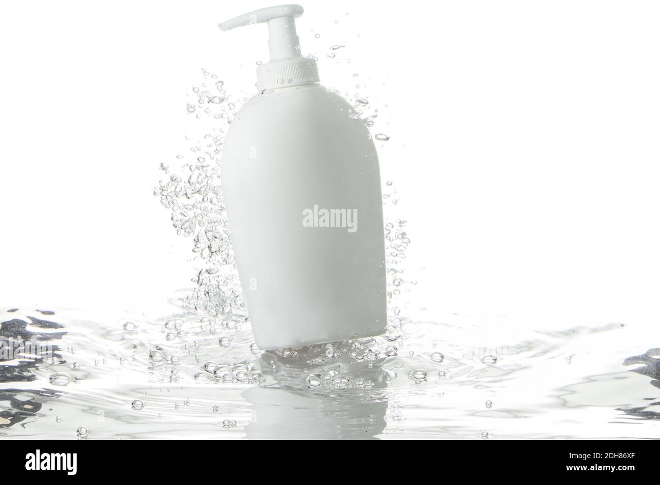 liquid soap dispenser and bubbles over rippled water Stock Photo - Alamy