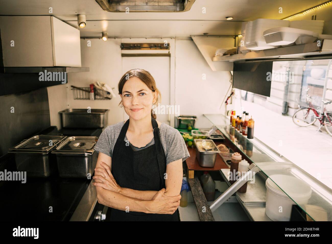 Portrait of confident female chef in food truck Stock Photo - Alamy