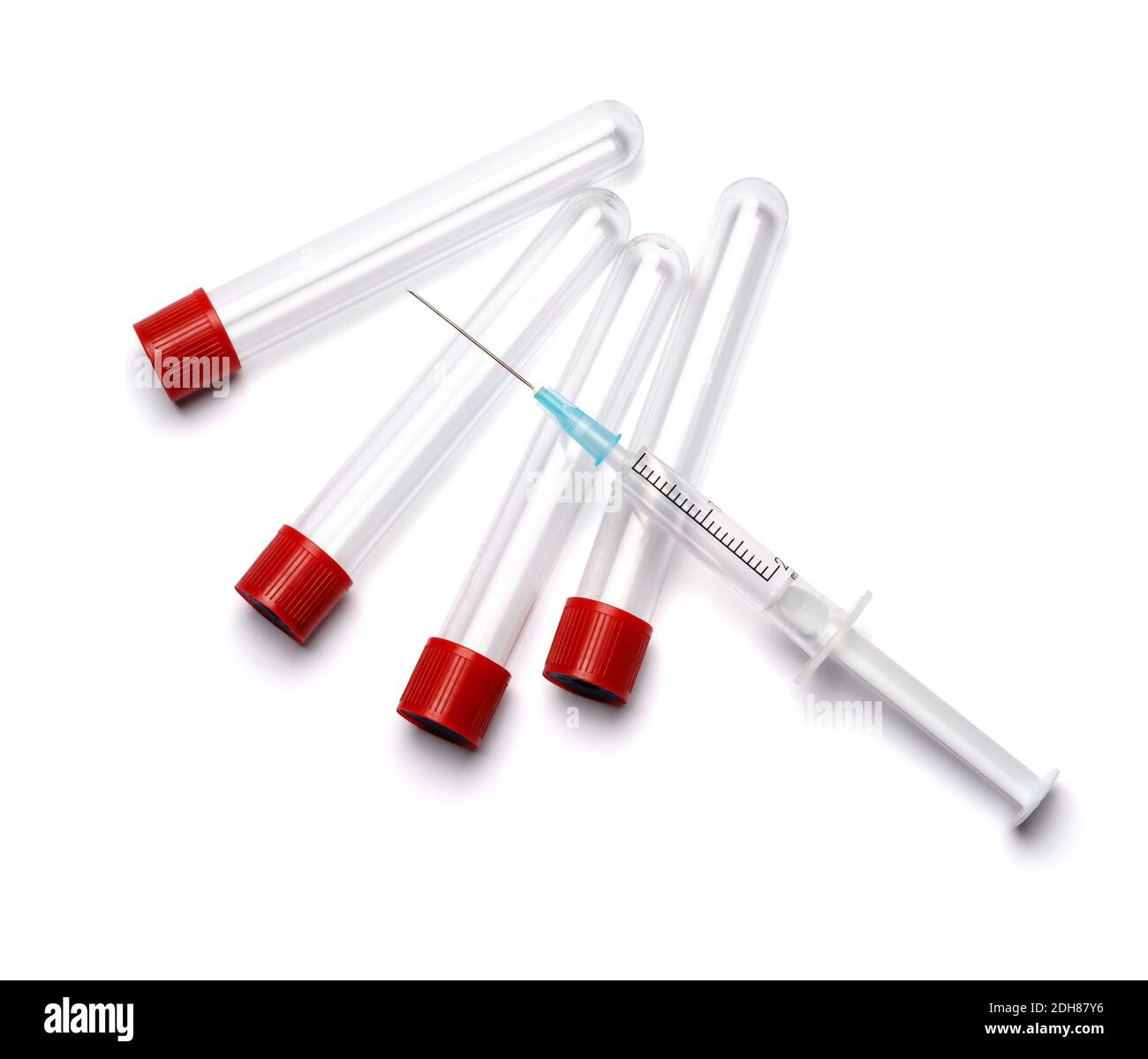 Medical syringe and plastic test tube isolated on white background ...