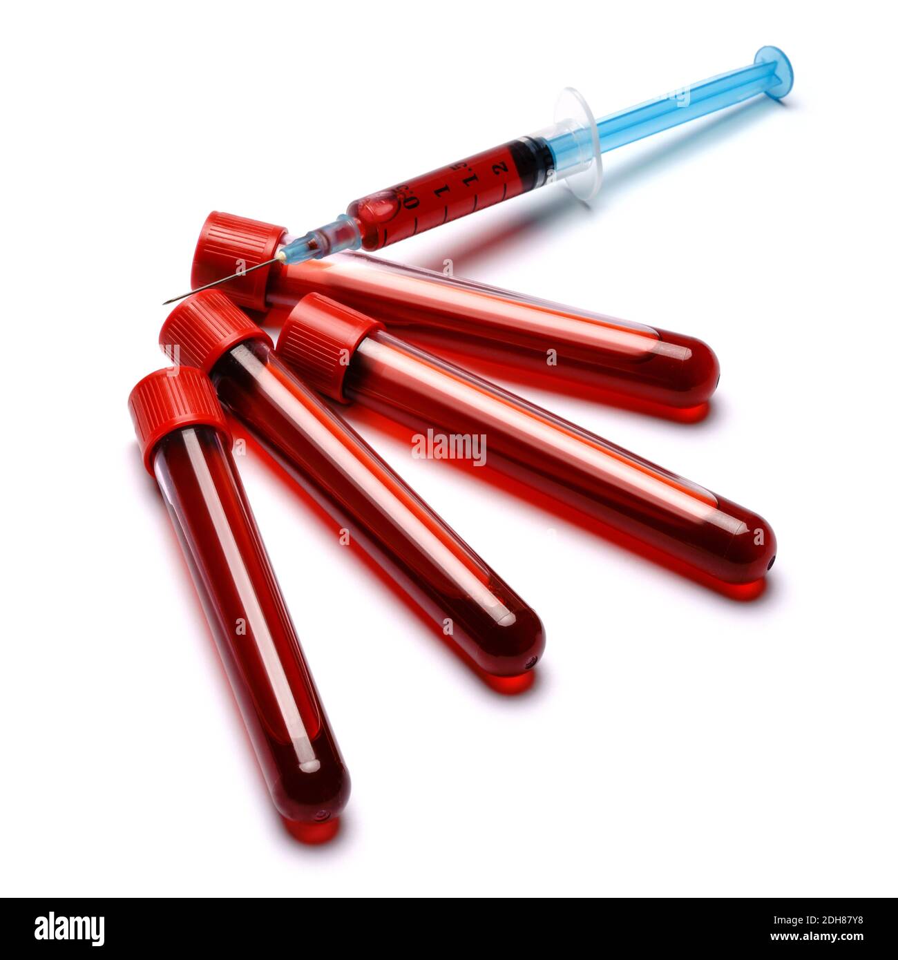 Medical syringe and plastic test tube isolated on white background ...