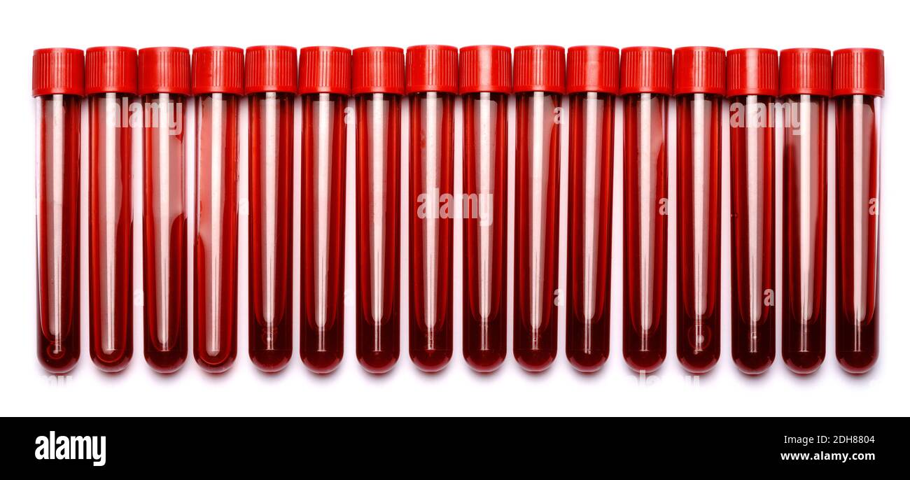 Test tubes with red plug isolated on white background Stock Photo - Alamy