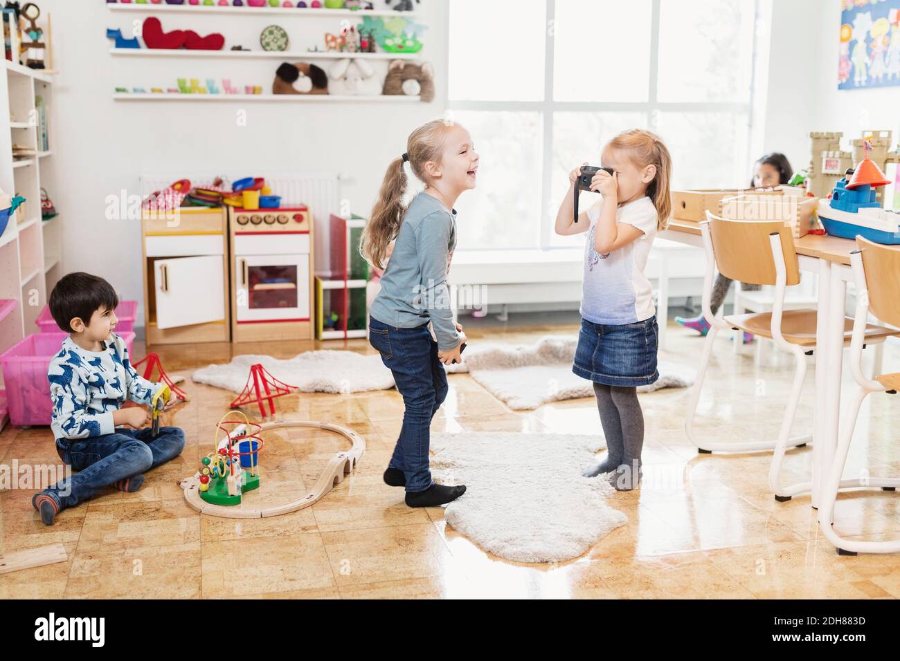 Girls laughing classroom hi-res stock photography and images - Alamy