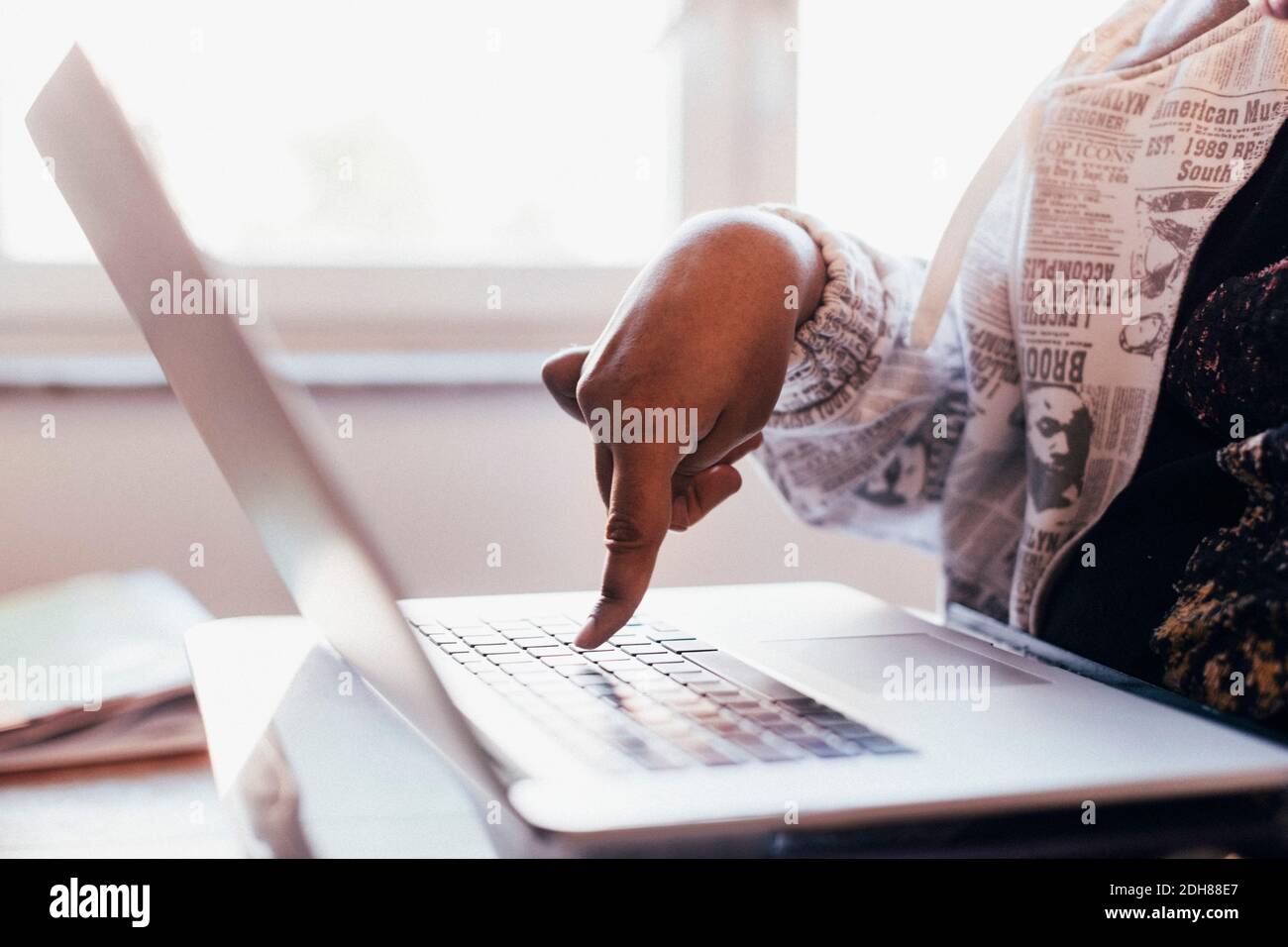 Disabled man using computer typing hi-res stock photography and images ...