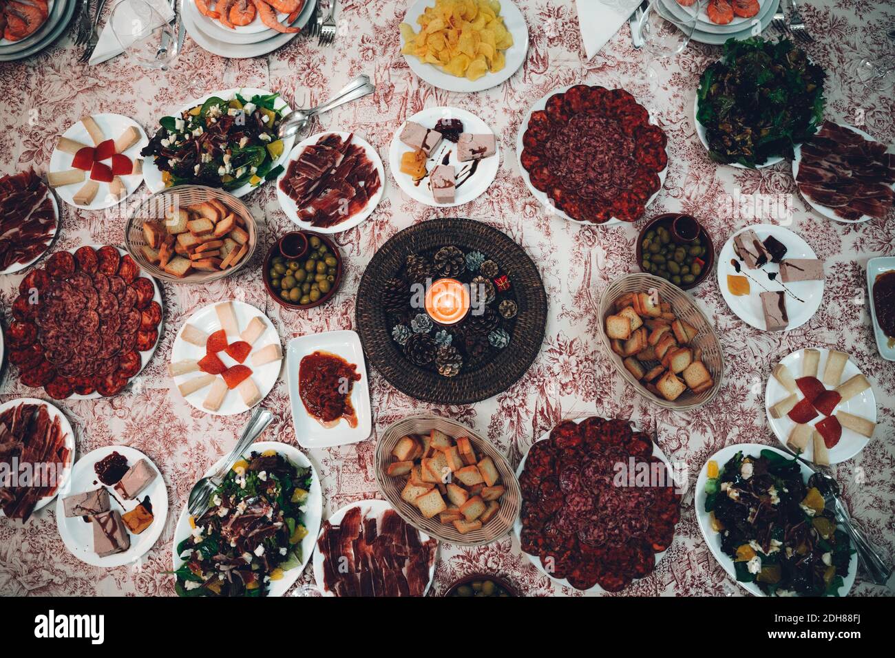 A top view of a delicious dinner table with a variety of appetizers ...