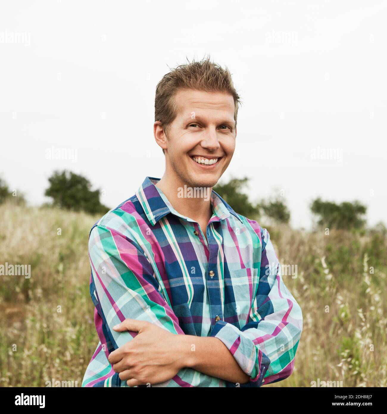 Portrait of smiling handsome mid adult man Stock Photo - Alamy