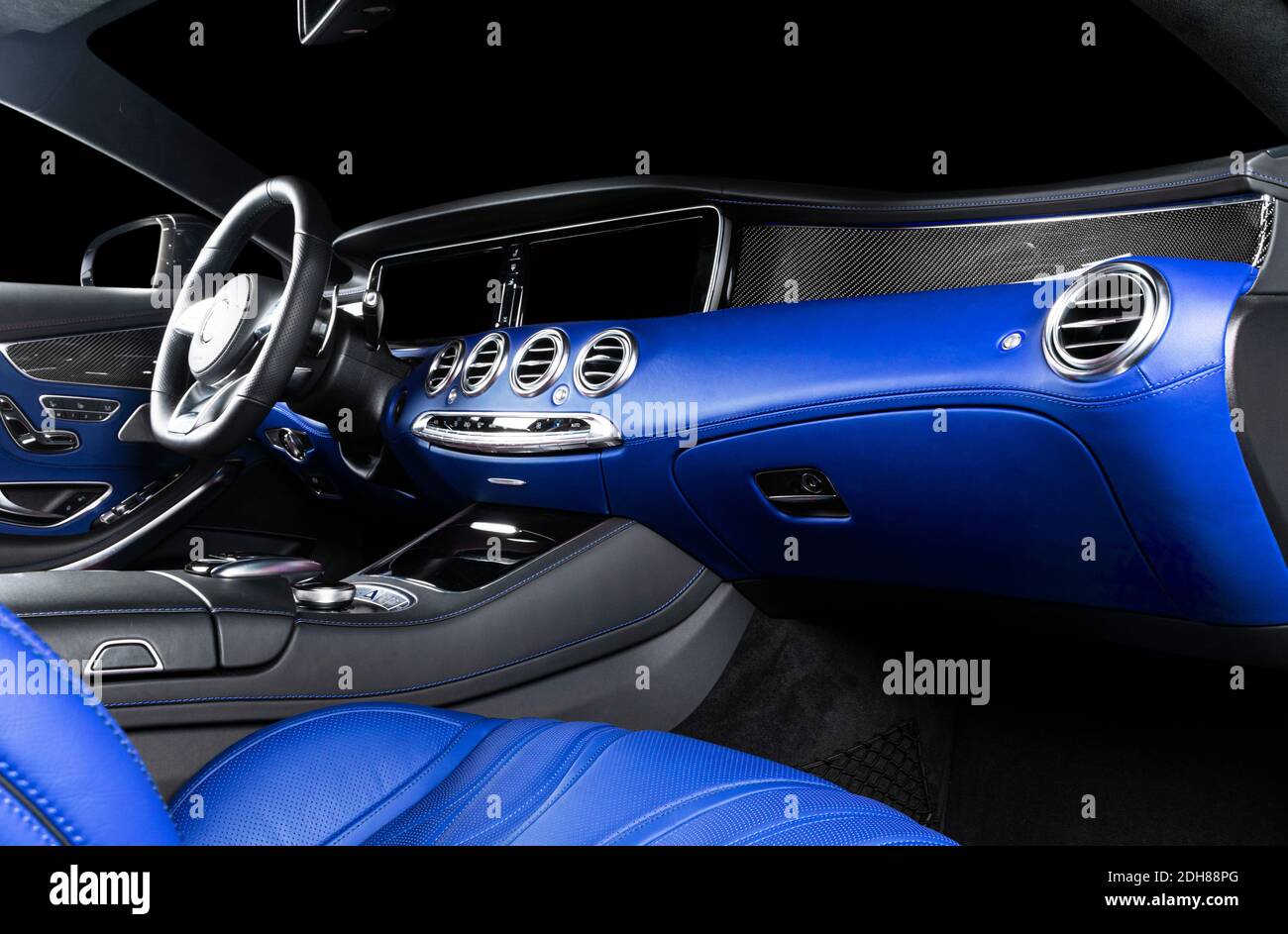 Blue luxury modern car Interior with steering wheel and dashboard ...