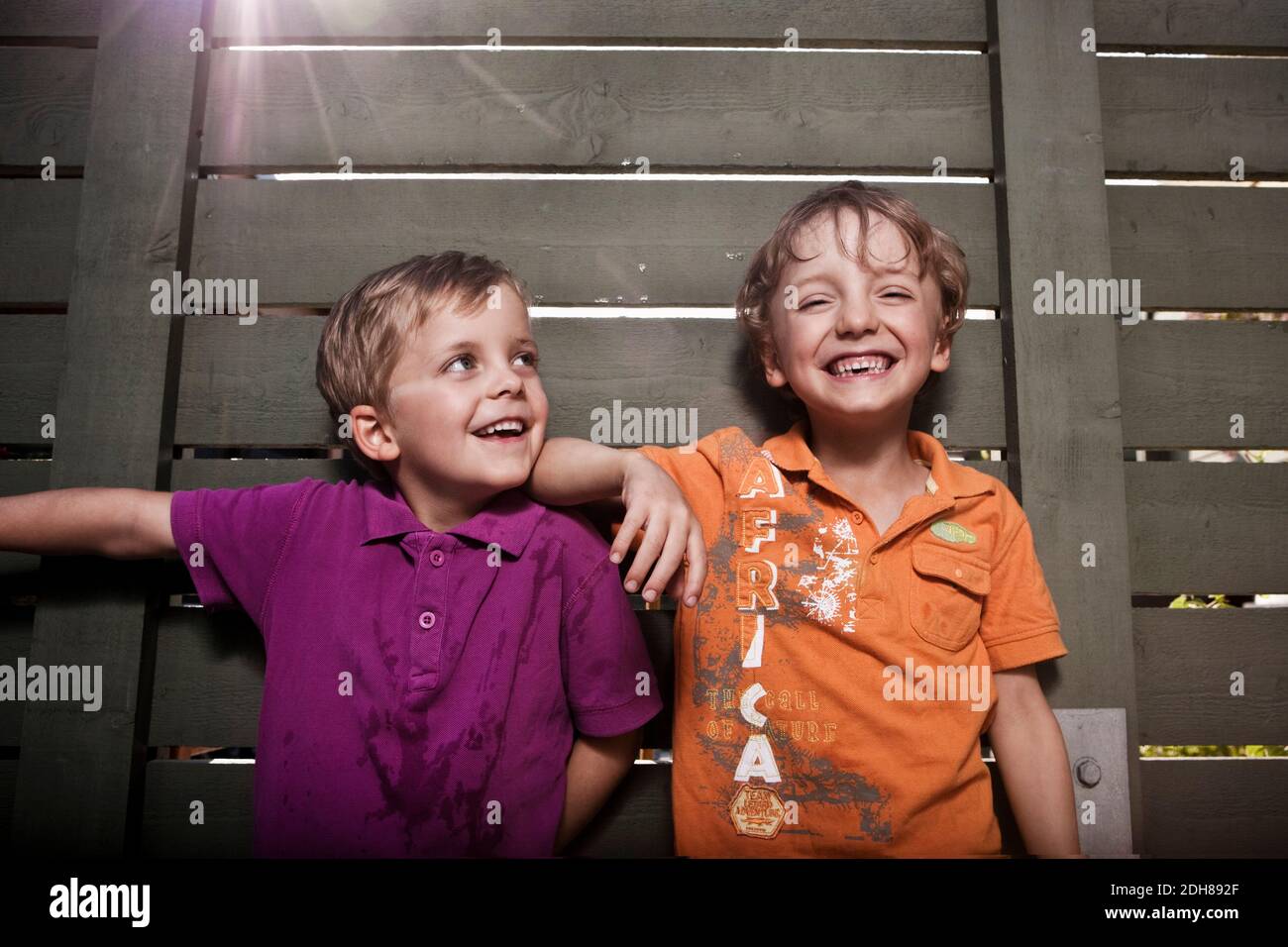 Brothers back to back standing hi-res stock photography and images - Alamy