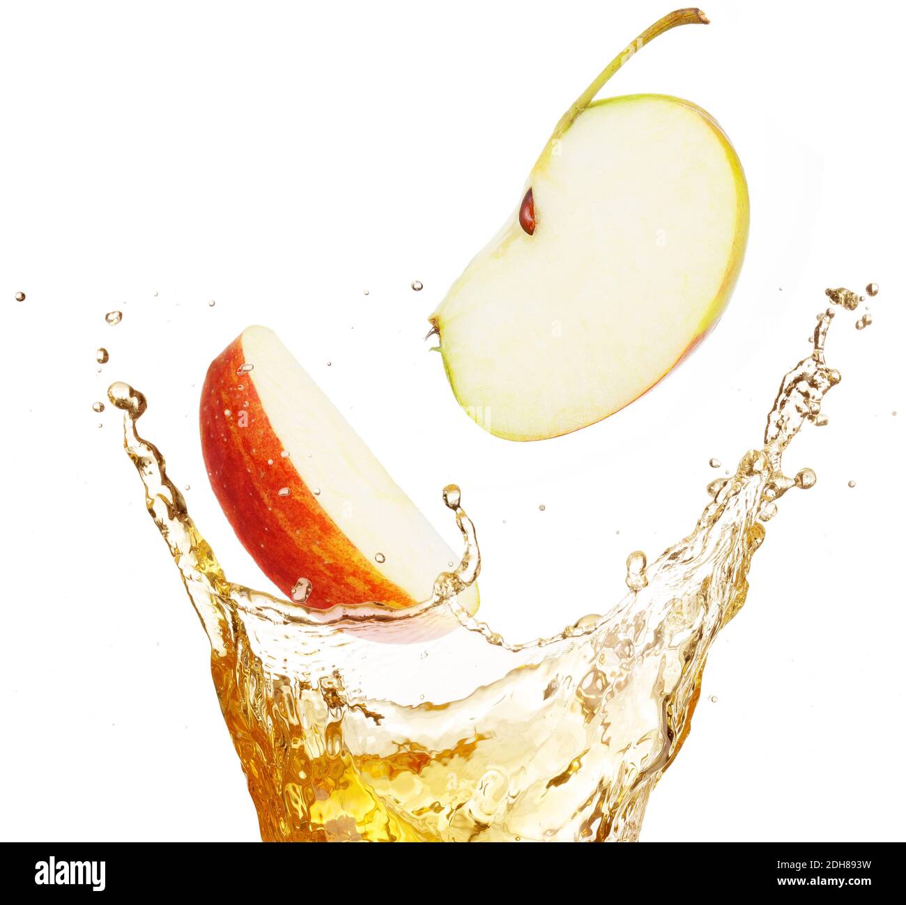 apple slices falling into splashing juice isolated on white Stock Photo ...