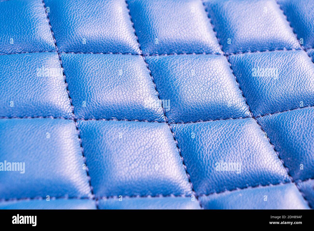 Modern luxury car blue leather interior. Part of perforated leather car ...