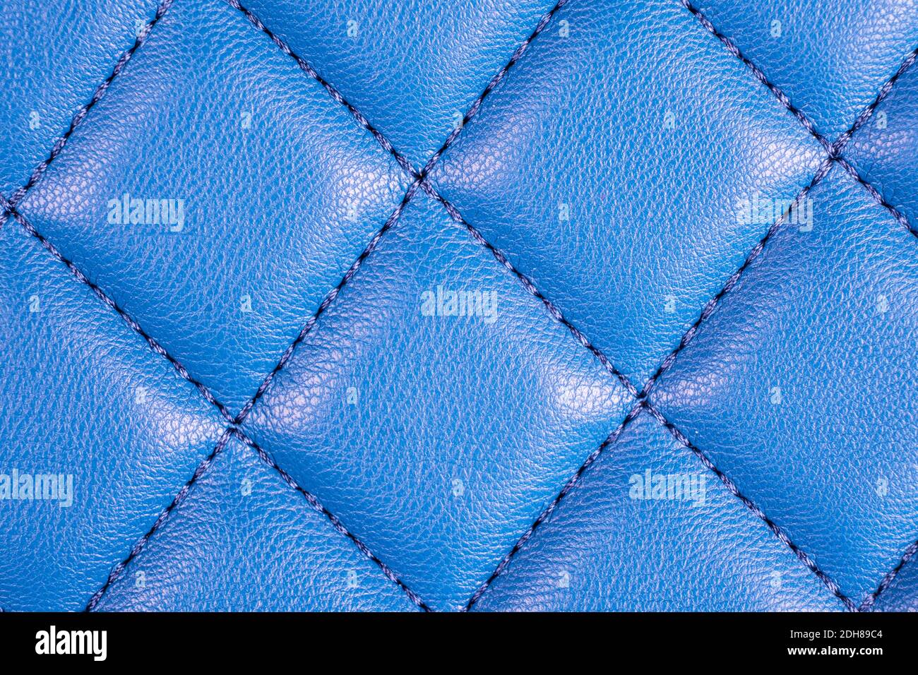 Modern luxury car blue leather interior. Part of perforated leather car ...