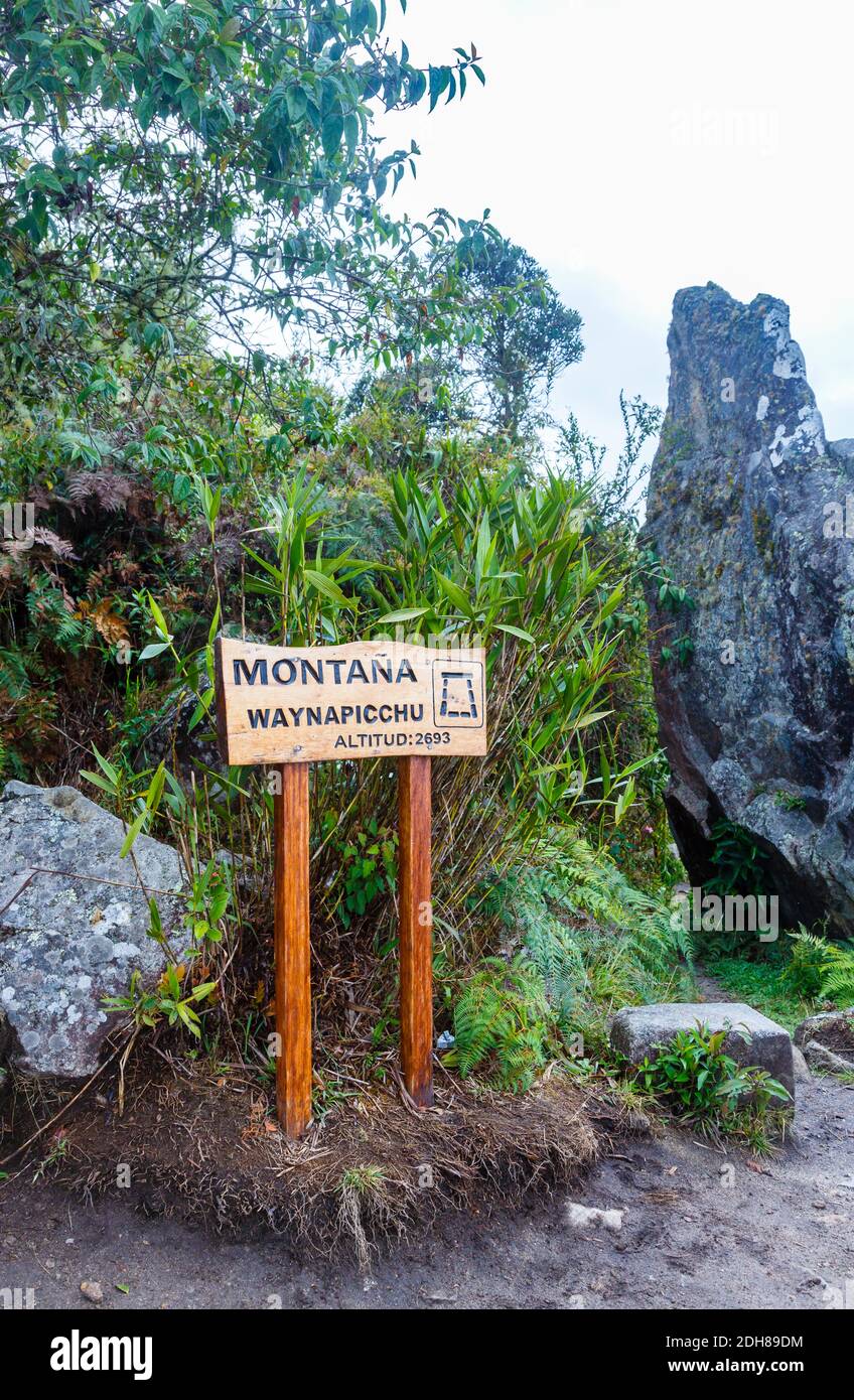 Wooden sign with the altitude of 2693 metres near the summit ascending ...