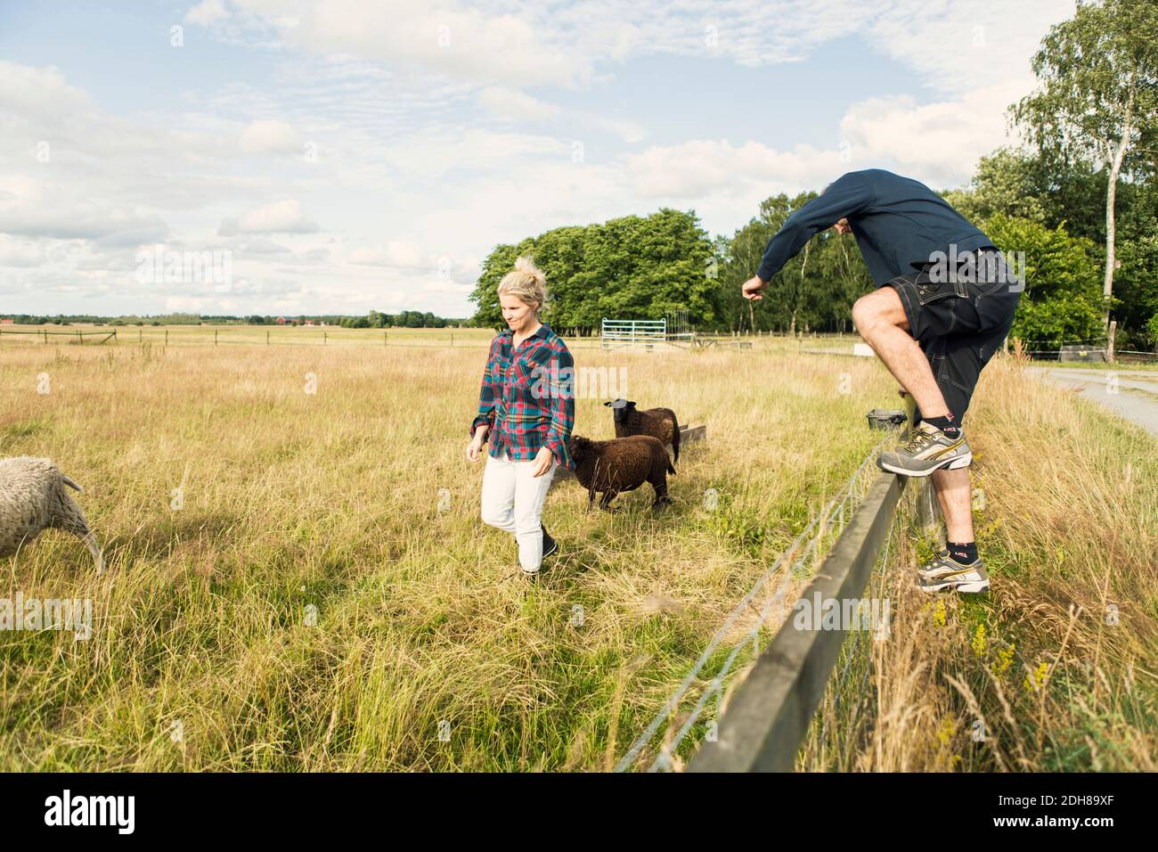 Man jumping over fence hi-res stock photography and images - Alamy