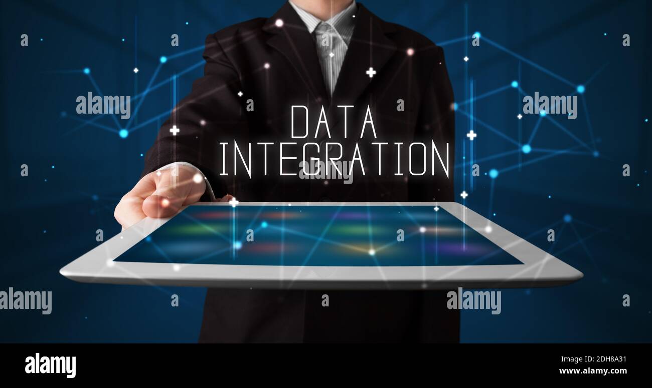 Young business person working on tablet and shows the digital sign ...