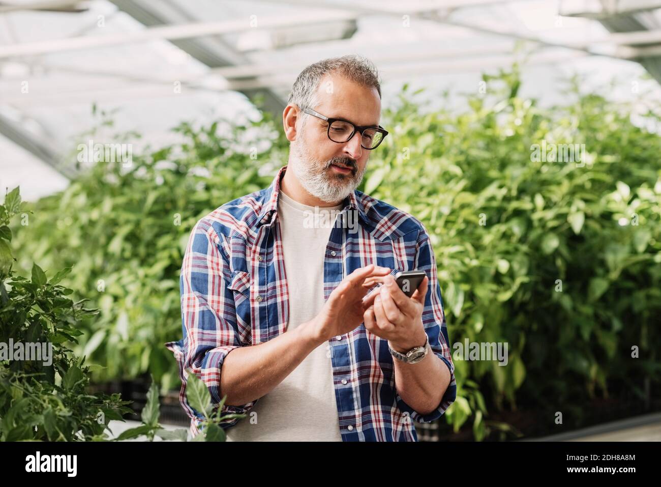 Man using farm equipment hi-res stock photography and images - Alamy