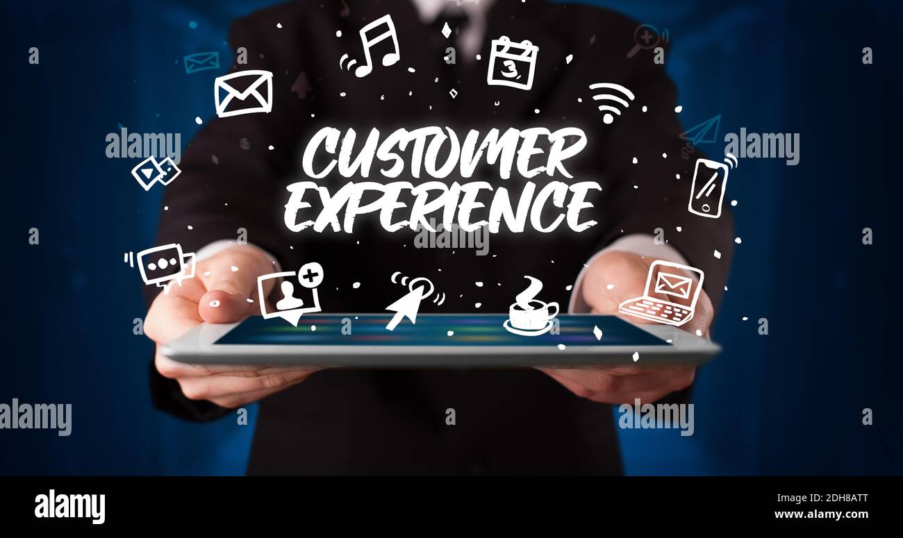 Young business person working on tablet and shows the inscription ...